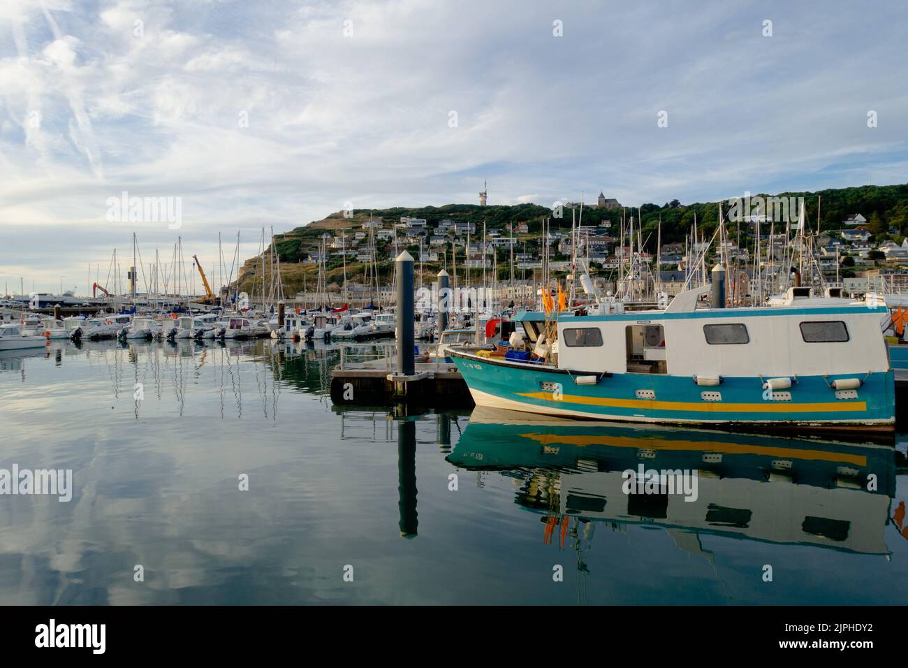 A boat docked in the harbor of the French city of Fécamp Stock Photo ...