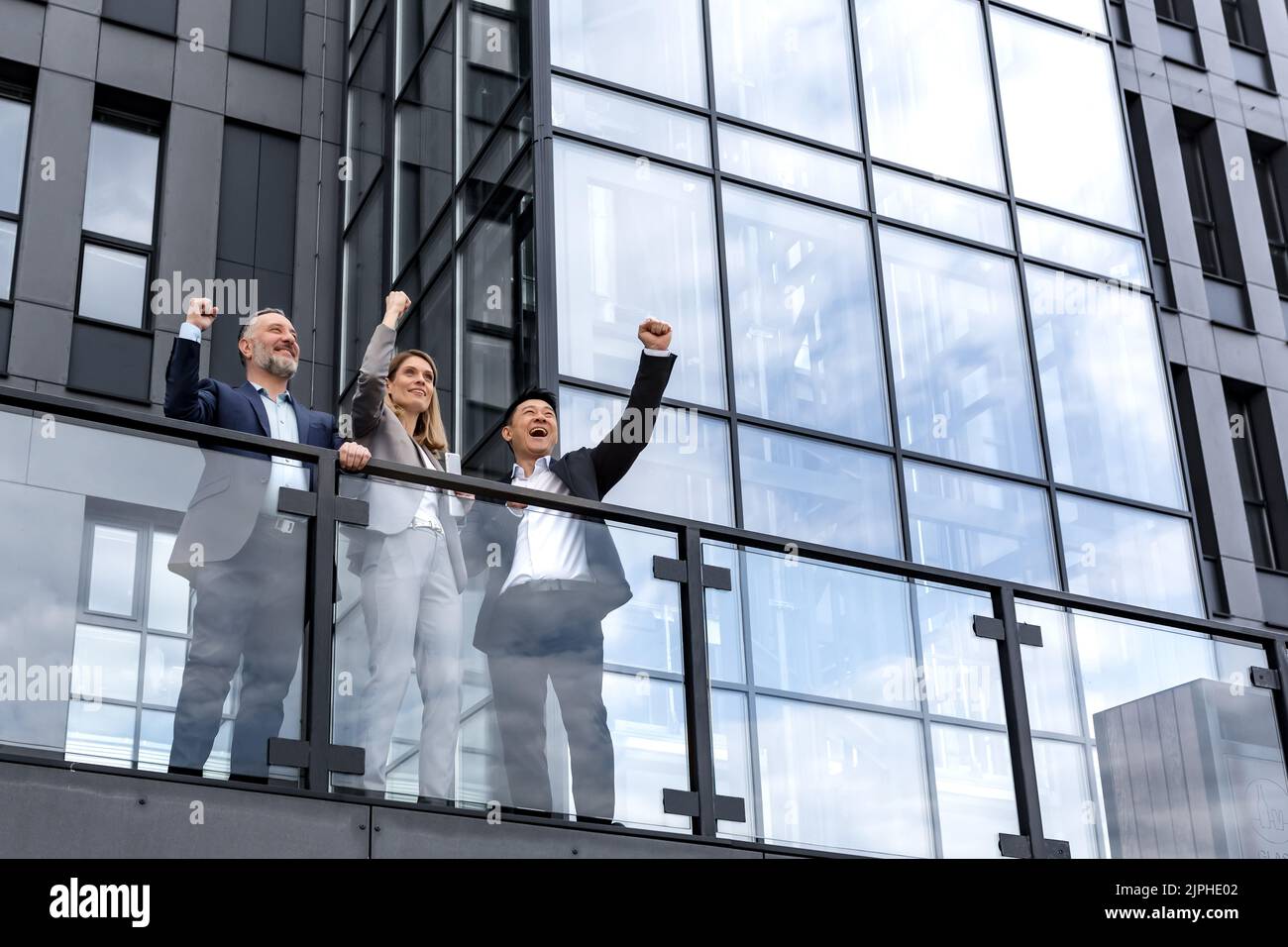 Diverse business group of people colleagues in business clothes outside ...