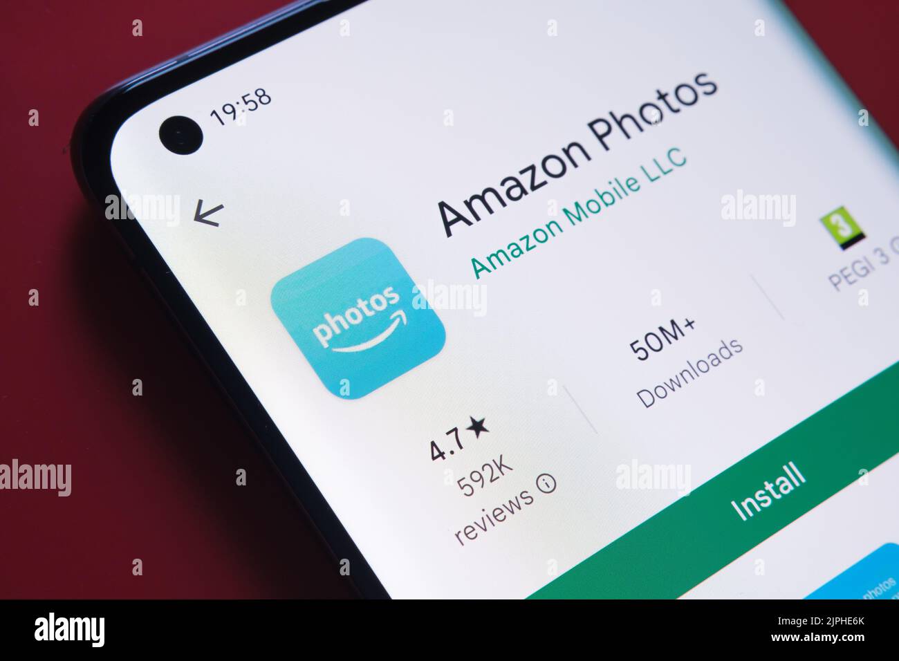 Amazon Photos app seen in Google Play Store on the smartphone screen ...