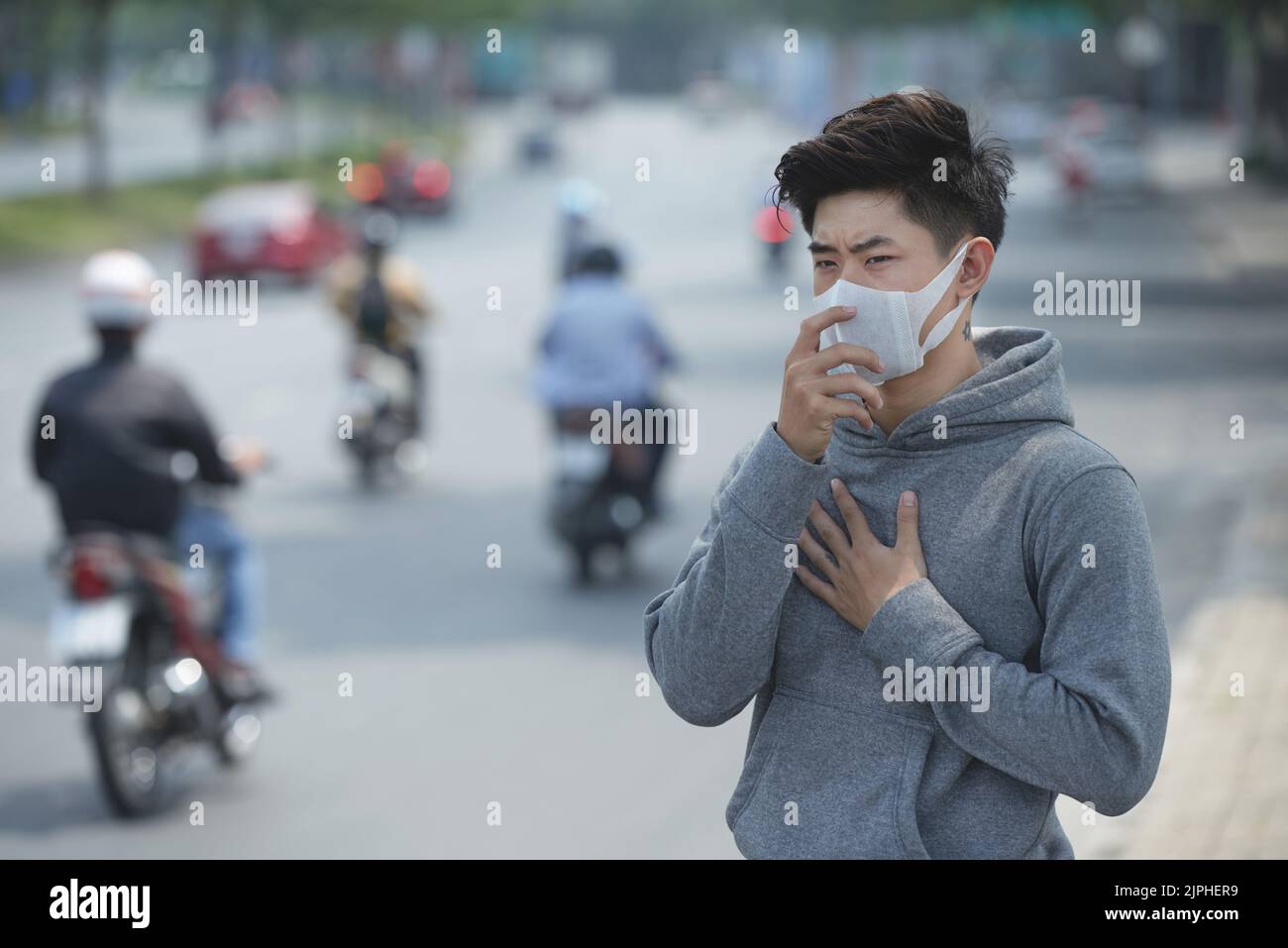 Red alert in polluted big Asian city Stock Photo - Alamy