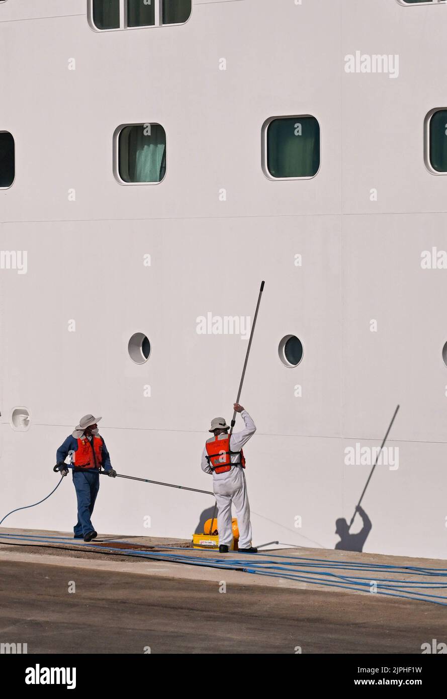 Rhodes, Greece - May 2022: Crew of a cruise liner cleaning the side of ...