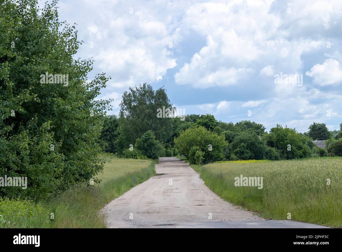 unpaved highway in rural areas, part of the road for cars without ...