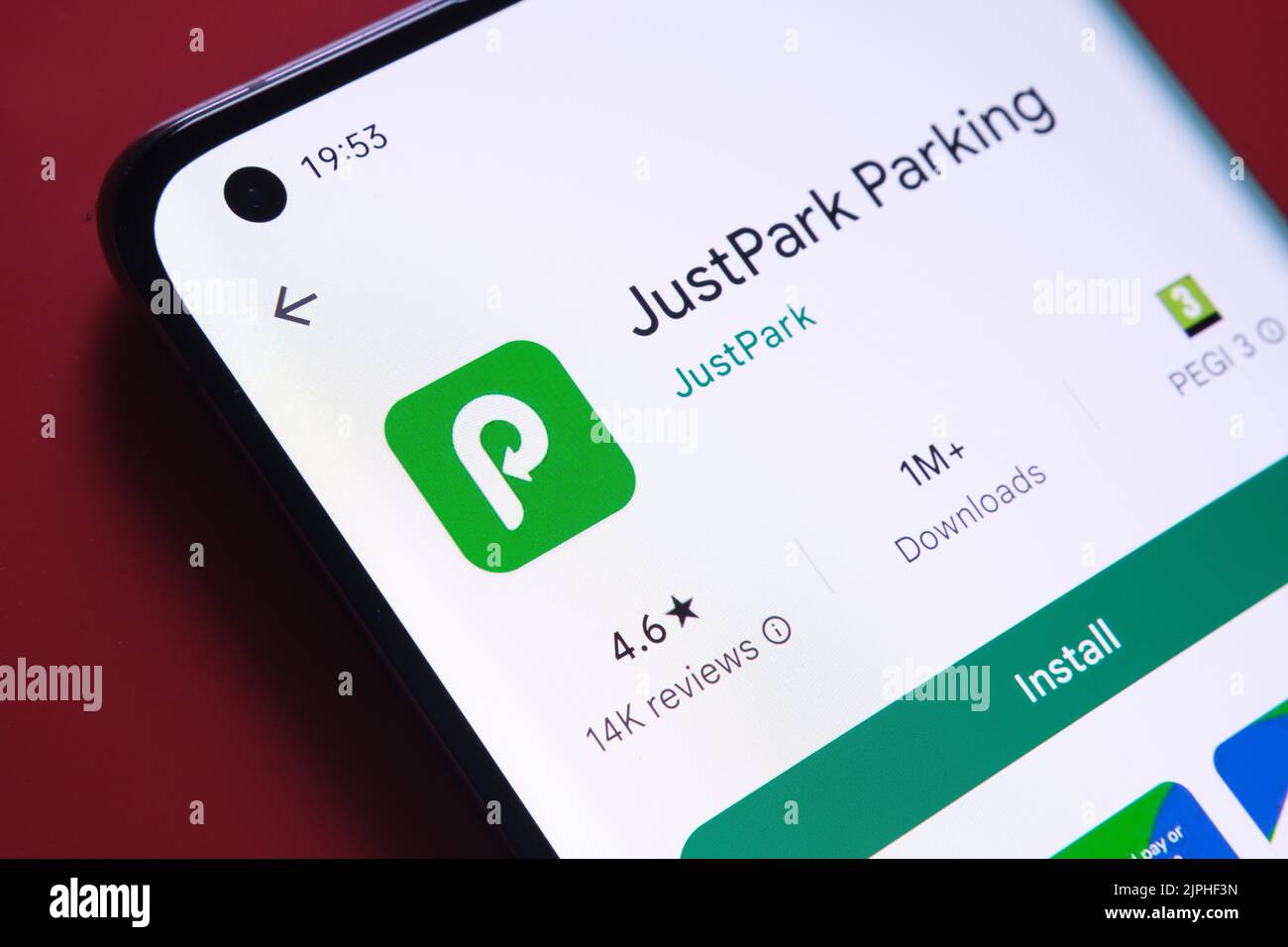 Justpark app seen in Google Play Store on the smartphone screen placed ...