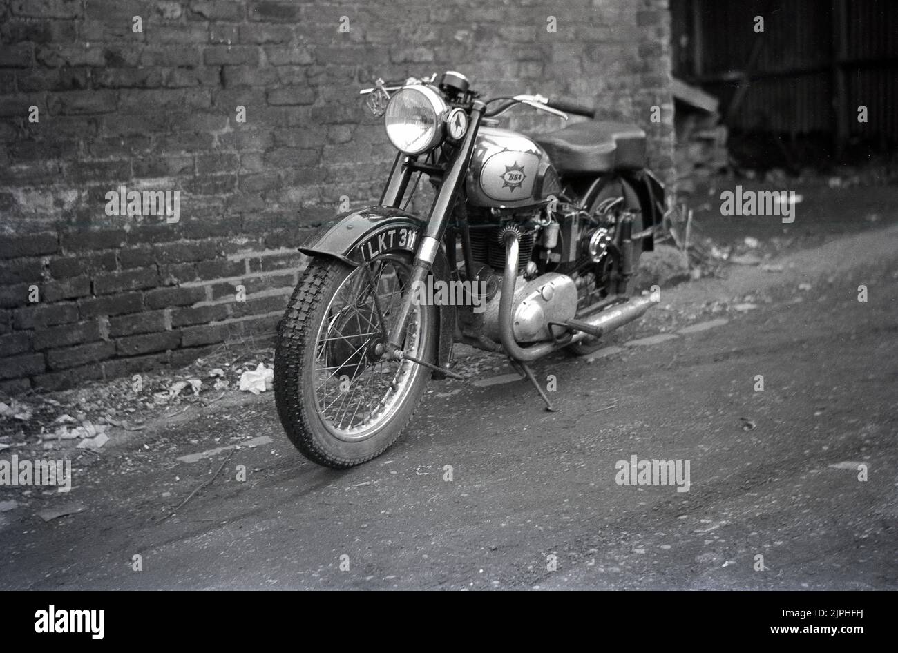 1950s, historical, a British made BSA motorcycle of the era parked on a ...