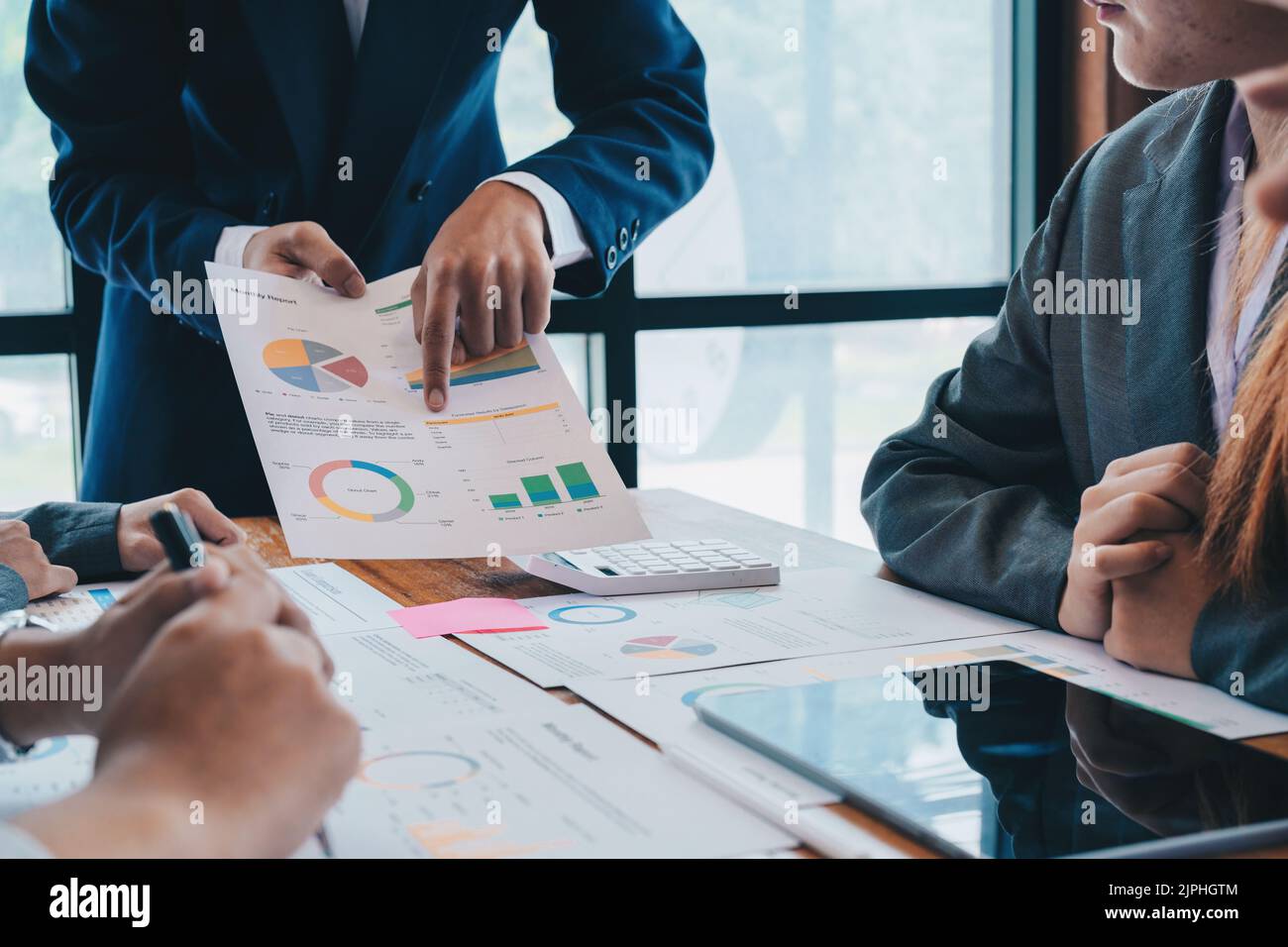 Business People Meeting to analyse and discuss and brainstorming the ...