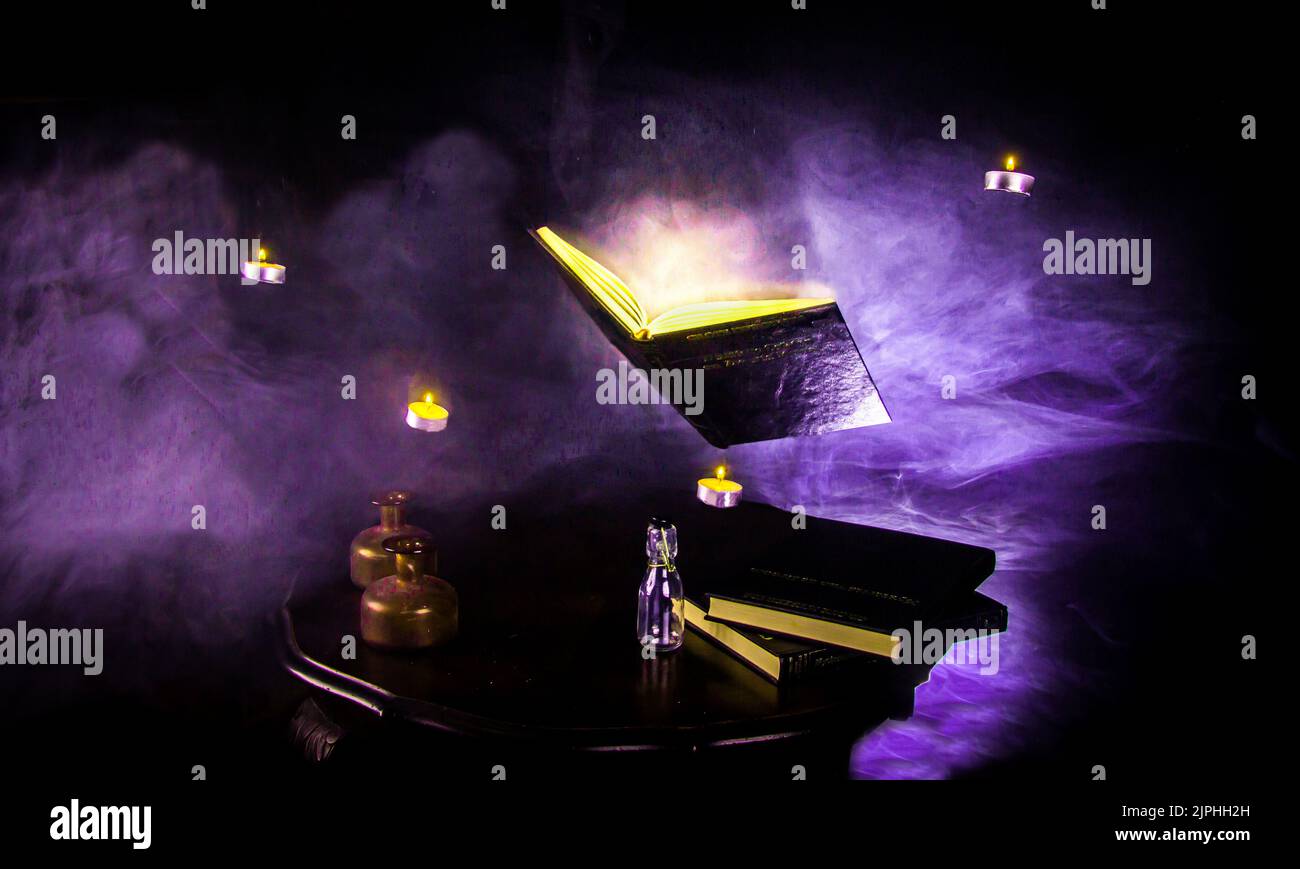 Magic book of spells Stock Photo - Alamy