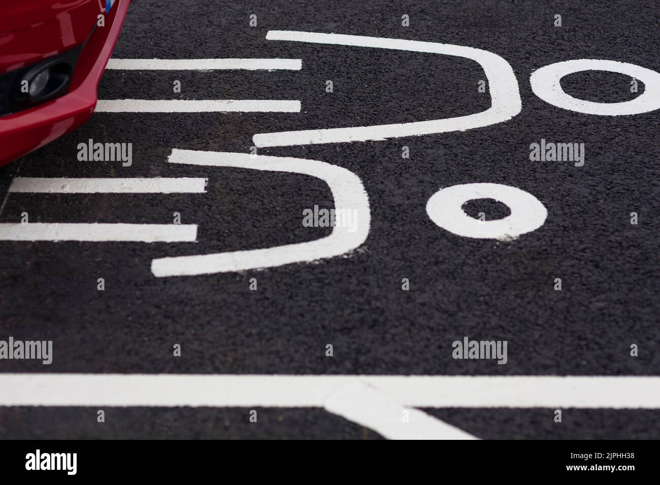 car crossing family parking space Stock Photo - Alamy