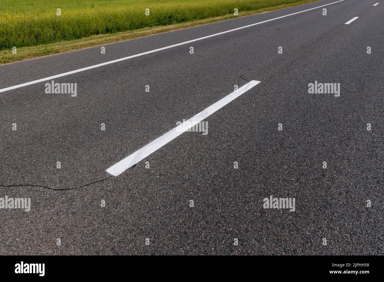 paved road for car traffic, road for vehicles with white road markings ...