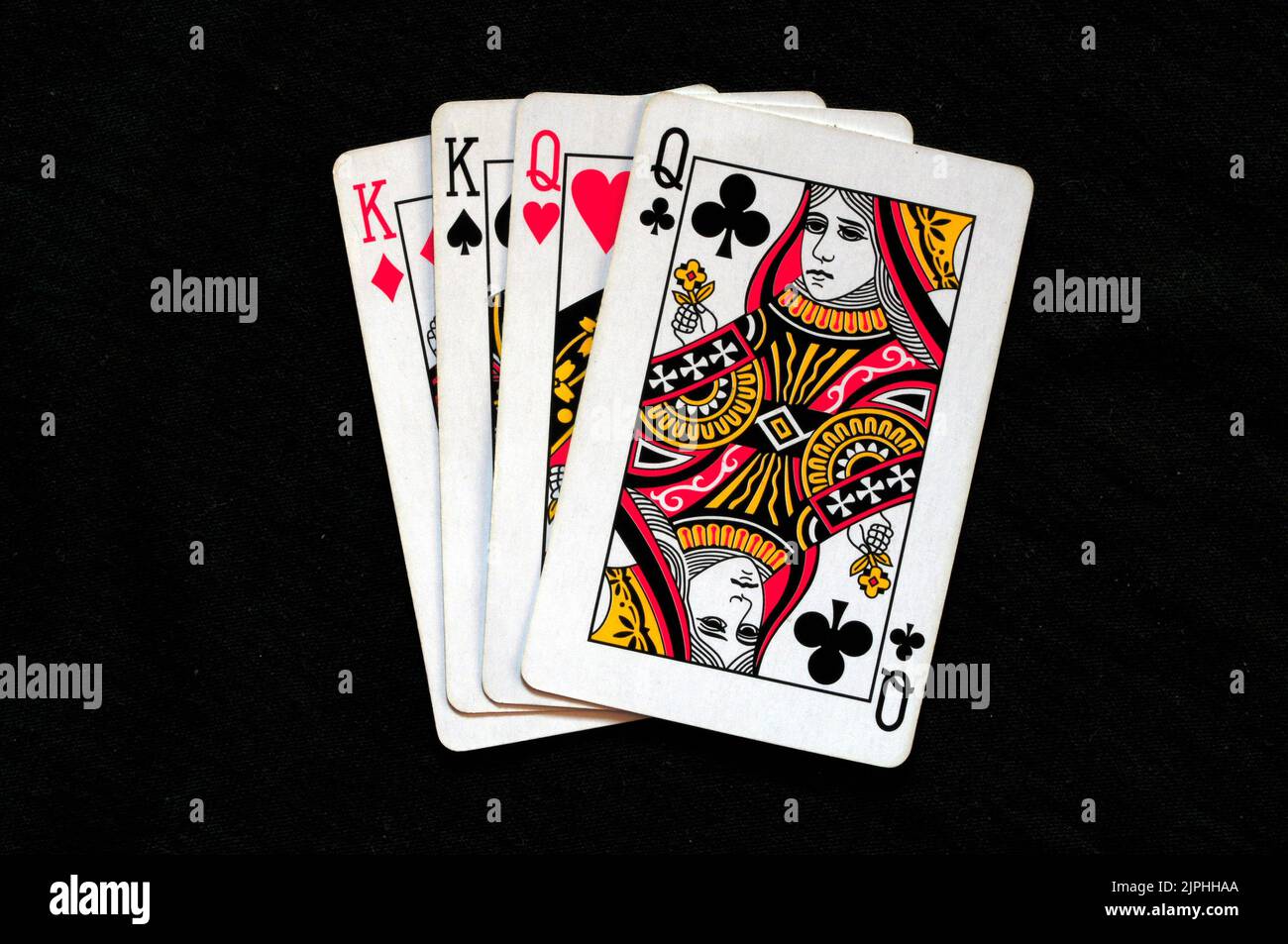 Hand of two pairs playing cards Stock Photo - Alamy