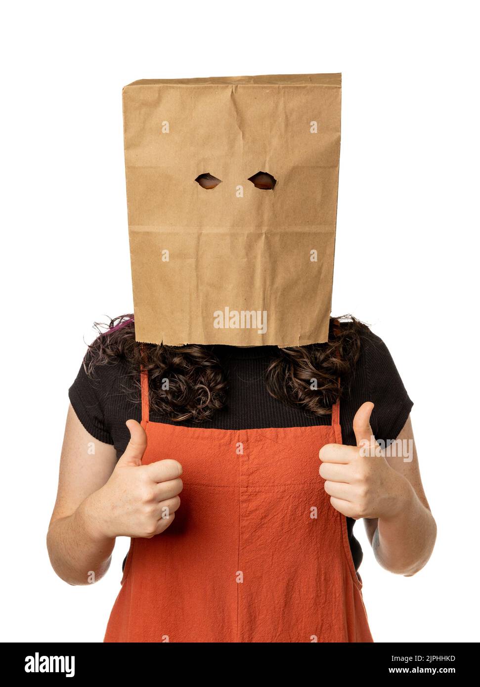Woman wearing paper bag over her head with two thumbs up for approval ...