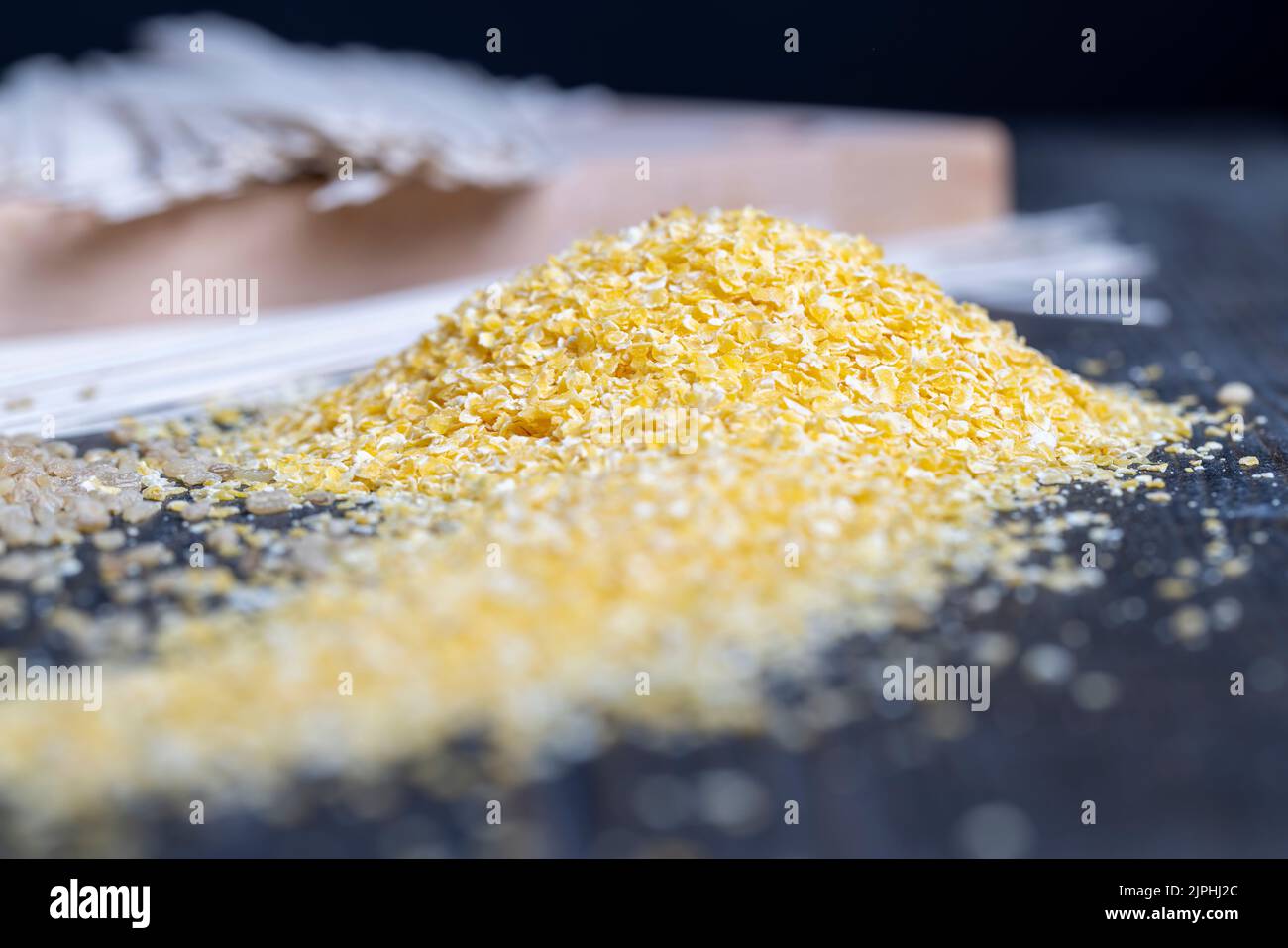 Finely crushed corn kernels into flakes for making porridge, crushed ...