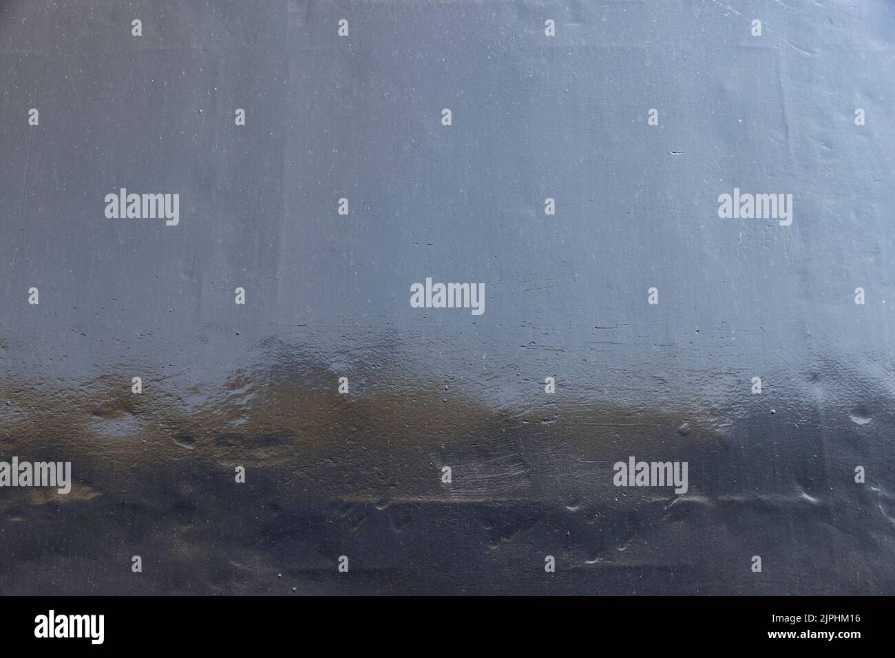 Part of the metal structure of an old steam locomotive, a sheet of ...