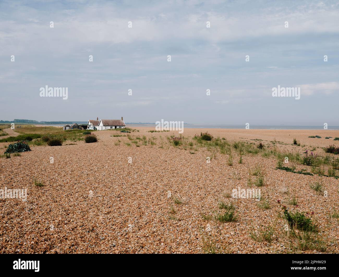 The summer beach landscape of Shingle Street Suffolk England UK Stock ...