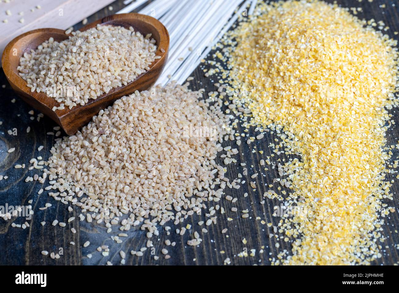 Fresh uncooked bulgur porridge on the table, cooking dishes from ...