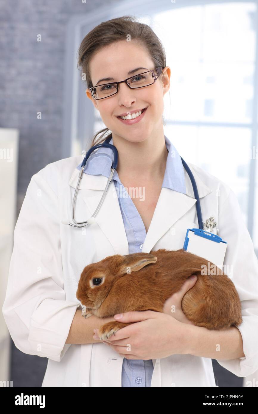 Woman with rabbits hi-res stock photography and images - Alamy