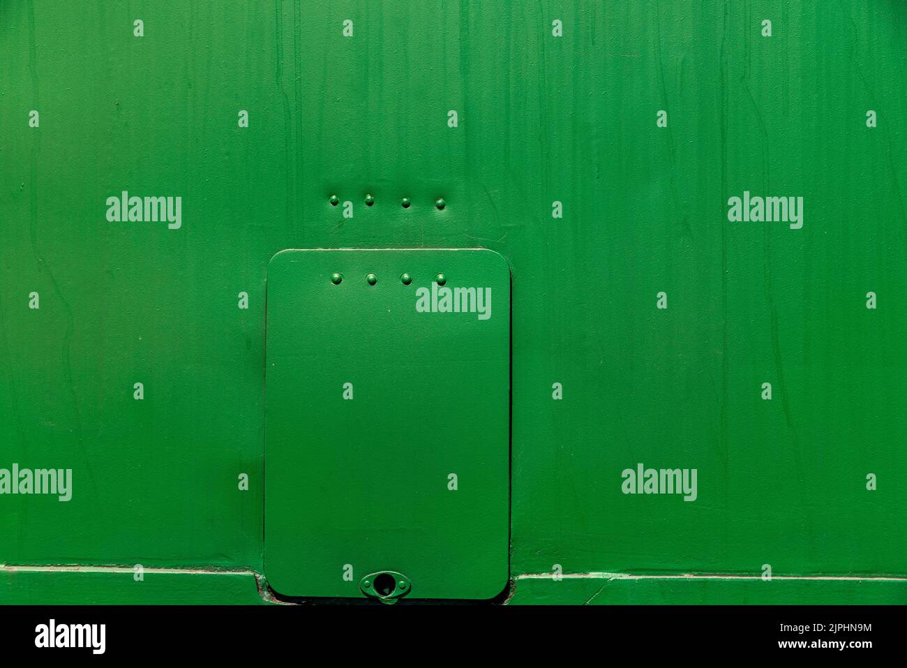 Part of the metal structure of an old steam locomotive, a sheet of ...