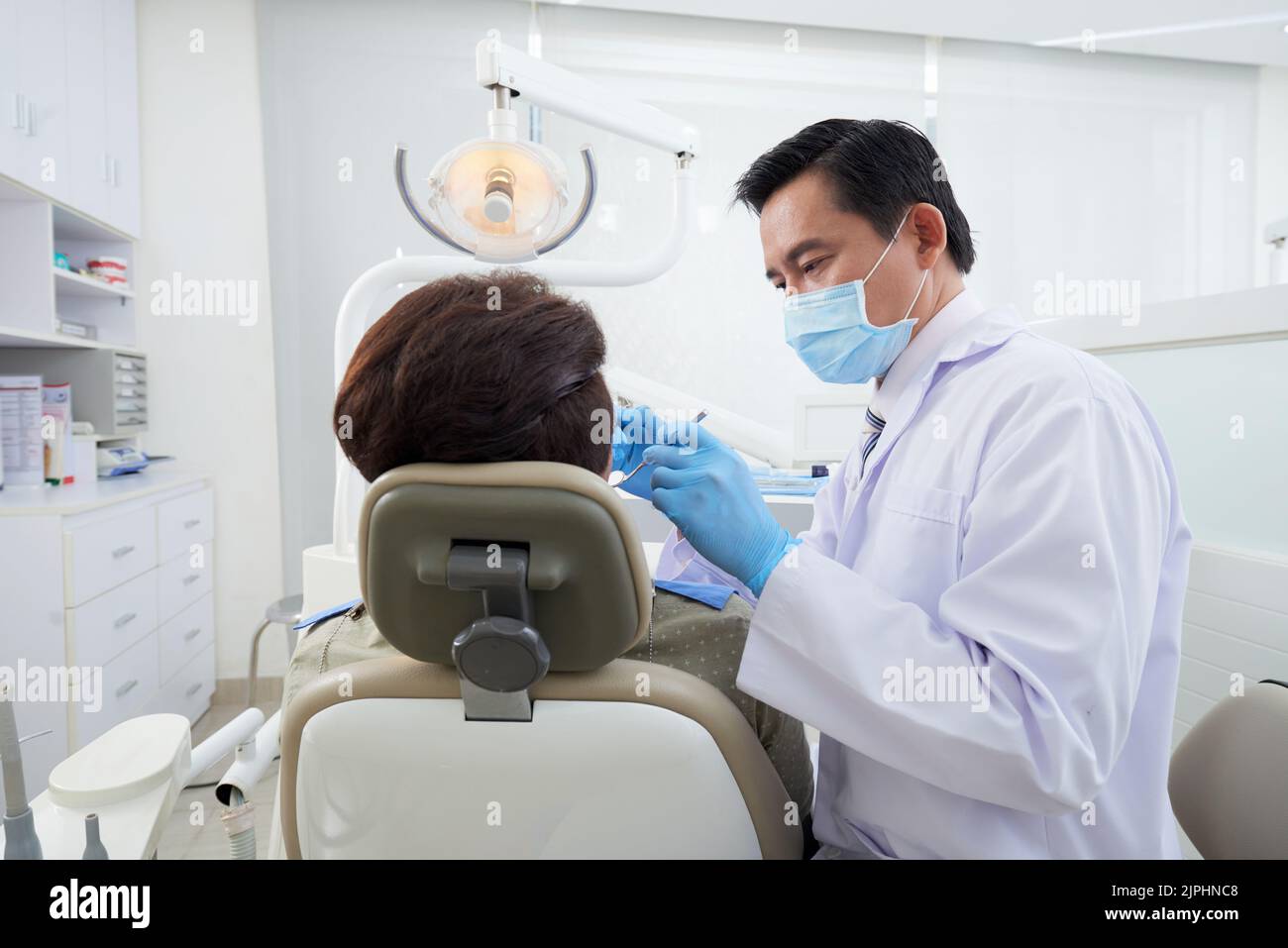 Professional teeth cleaning hi-res stock photography and images - Alamy