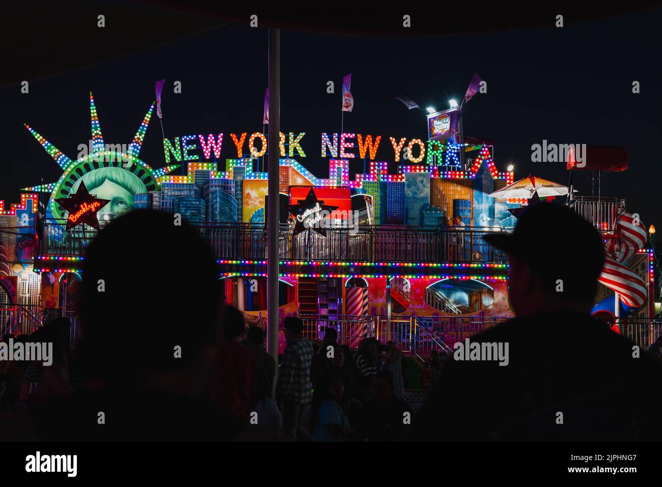 A county fair at night with colorful lights in Los Angeles, United ...