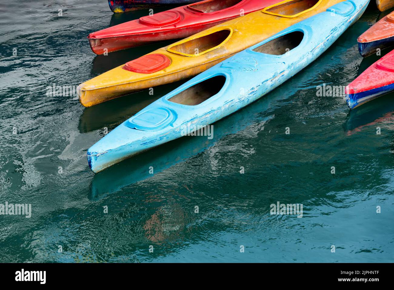 Colourful kayaks in the sea in Ha Long Bay Stock Photo - Alamy