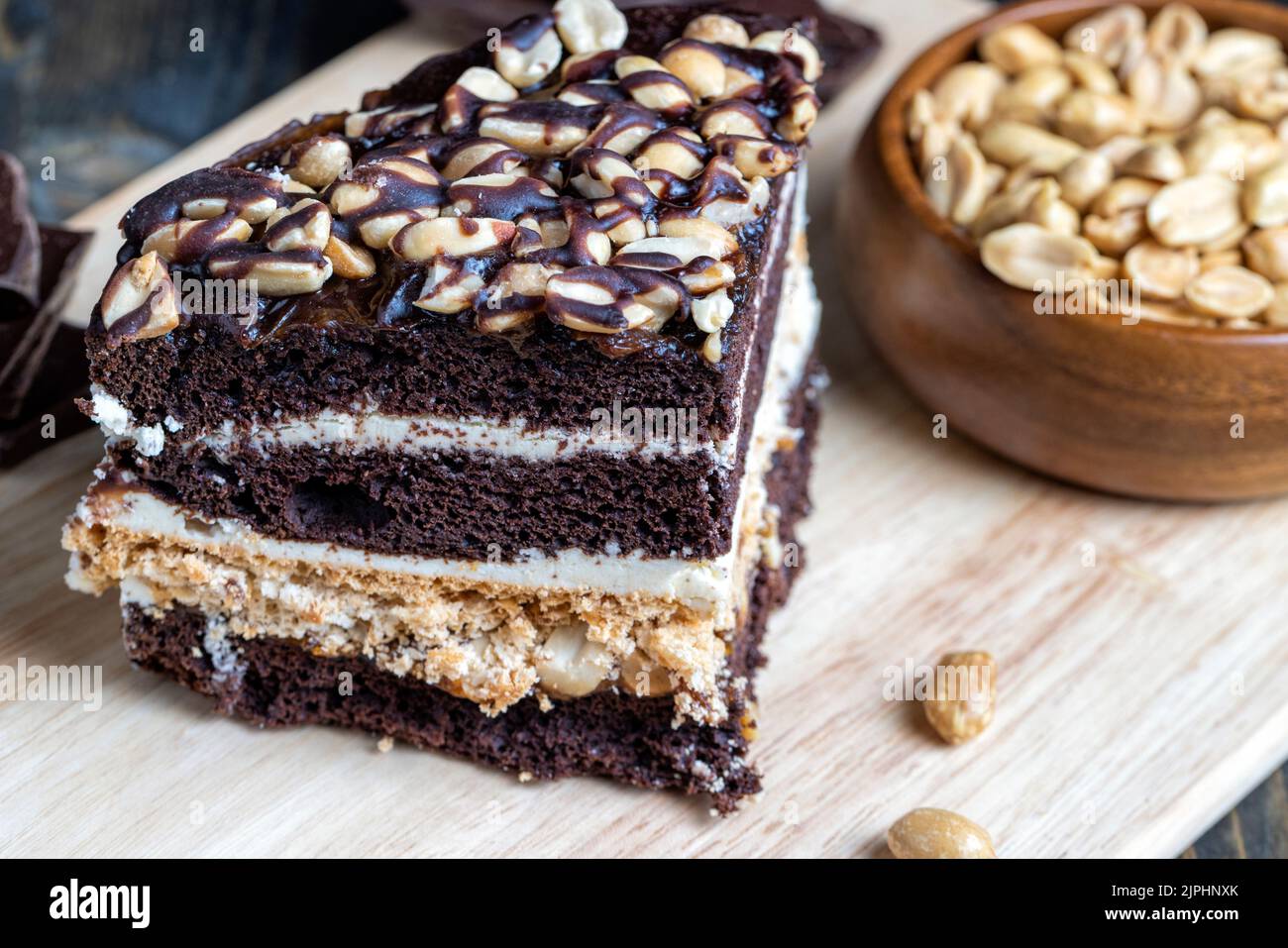 chocolate cake with nut filling and peanuts, dessert of chocolate cake ...