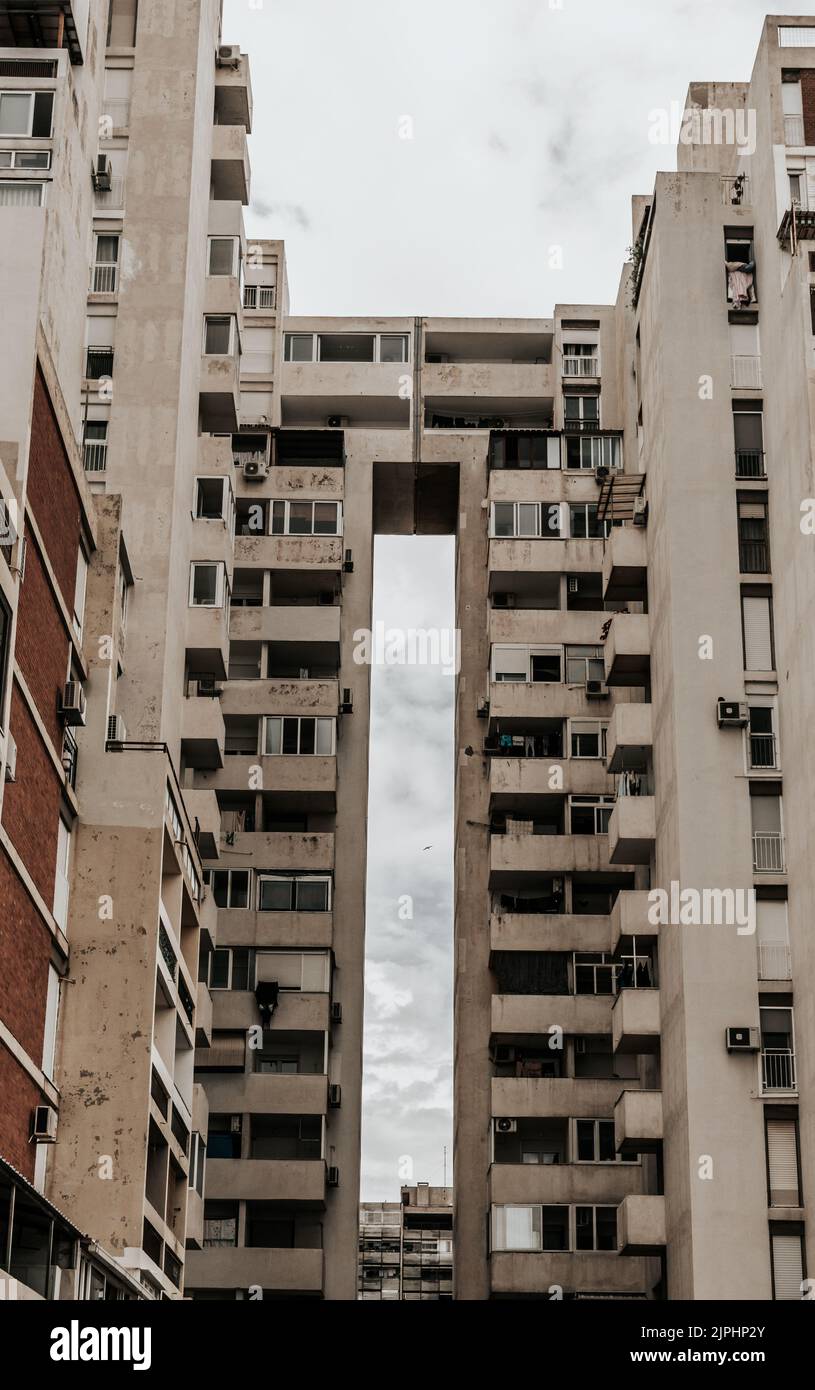 A vertical shot of the brutalist multi-story concrete building in Split ...