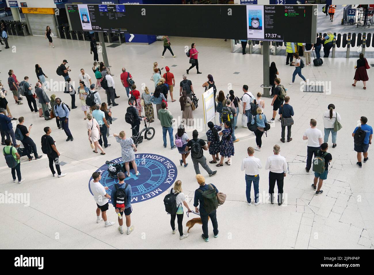 Commuters during the evening rush hour at Waterloo Station in London ...