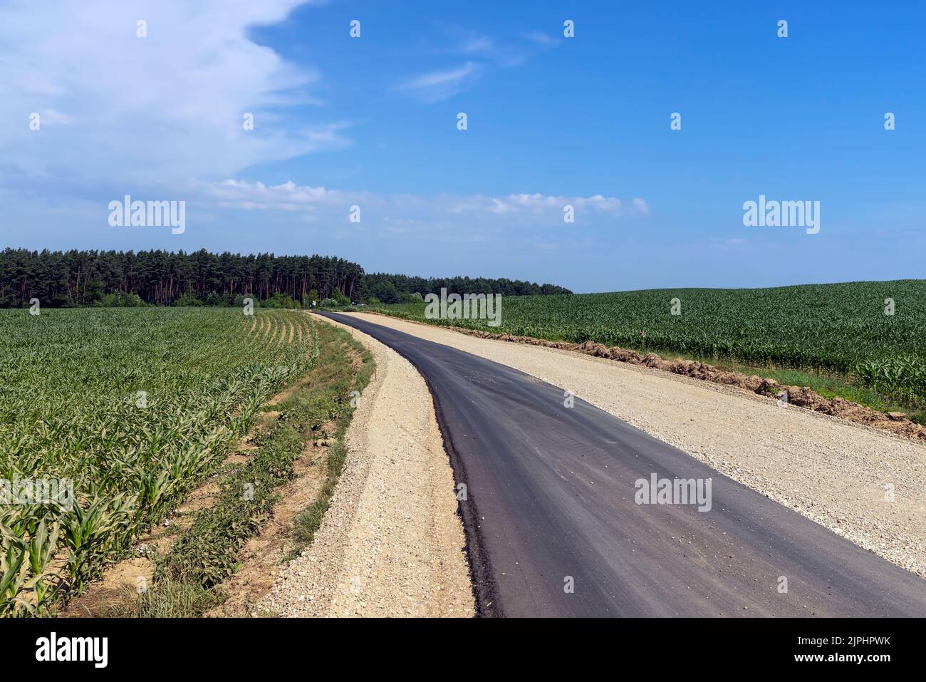paved road for car traffic, construction of a new paved road for transport in rural areas Stock ...