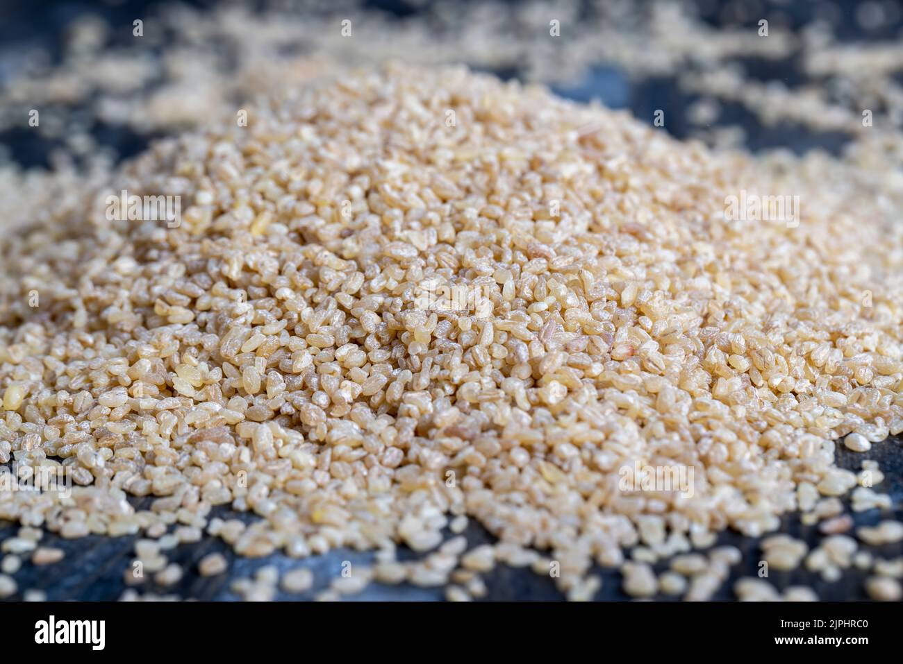 Fresh uncooked bulgur porridge on the table, cooking dishes from ...
