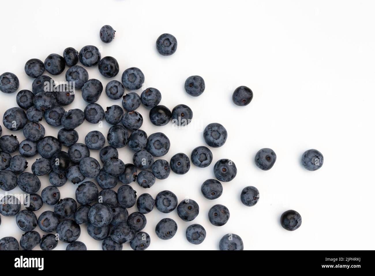 pile of freshly blueberries isolated on white background, heap of juicy ...