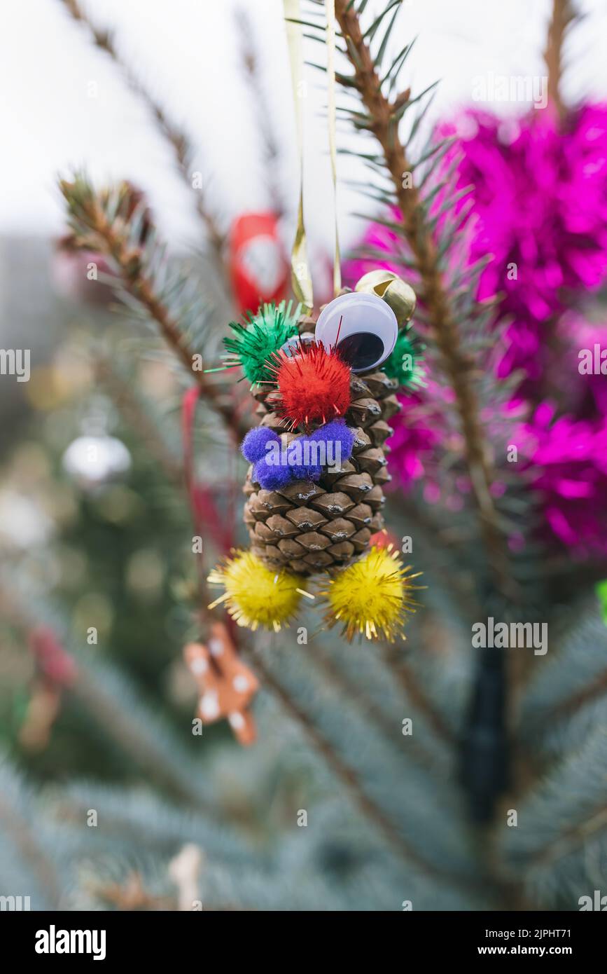 Pine cone, fluffy felt balls and googly eyes for crafts on Christmas ...