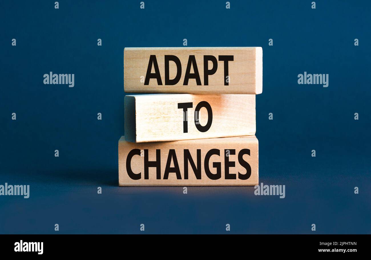 Adapt to changes symbol. Concept words Adapt to changes on wooden ...