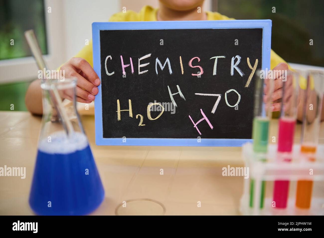 Blackboard with written inscription Chemistry, made with chalk in the ...