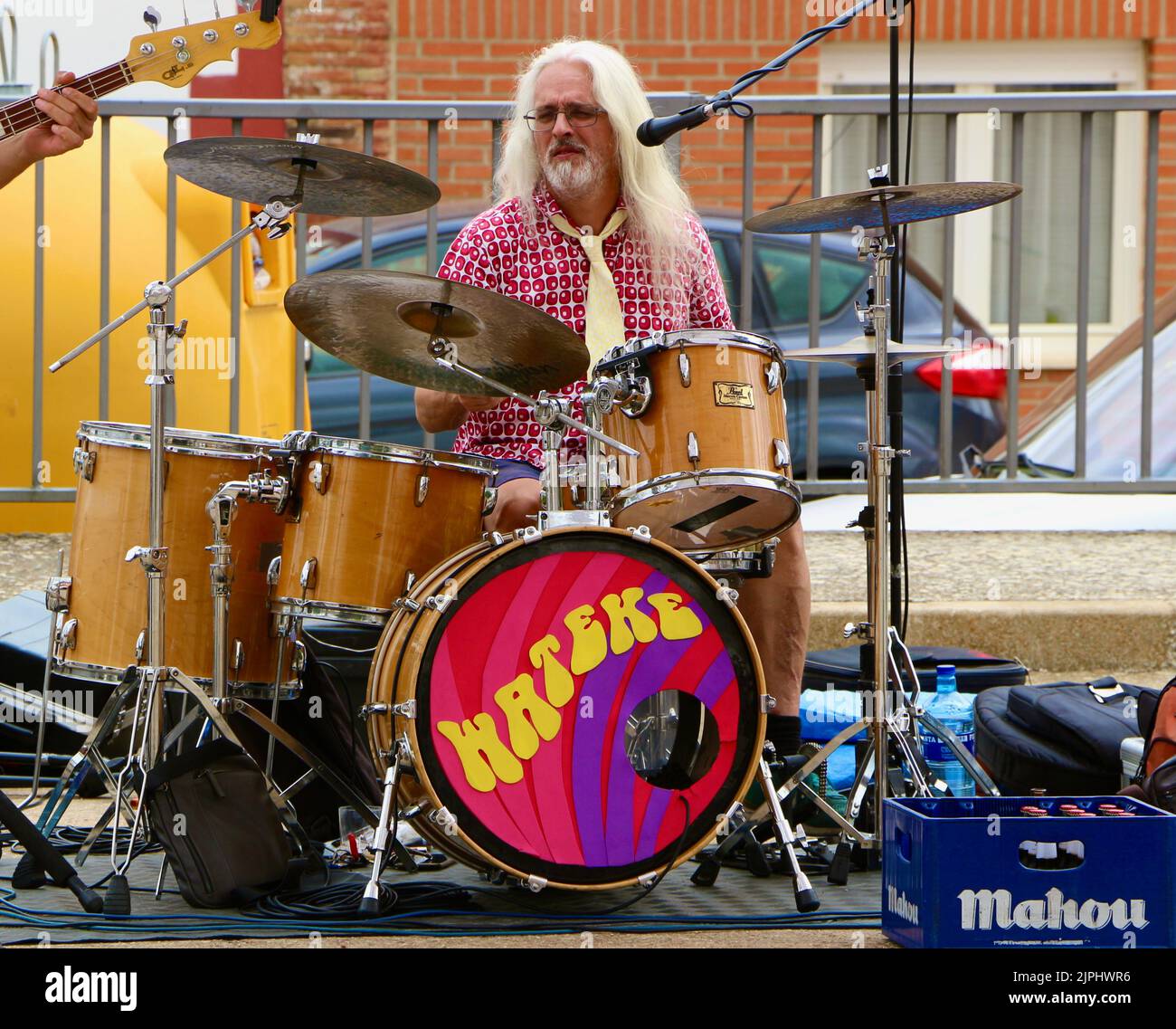Rock trio Wateke playing at lunchtime outside Bar Begona during summer ...