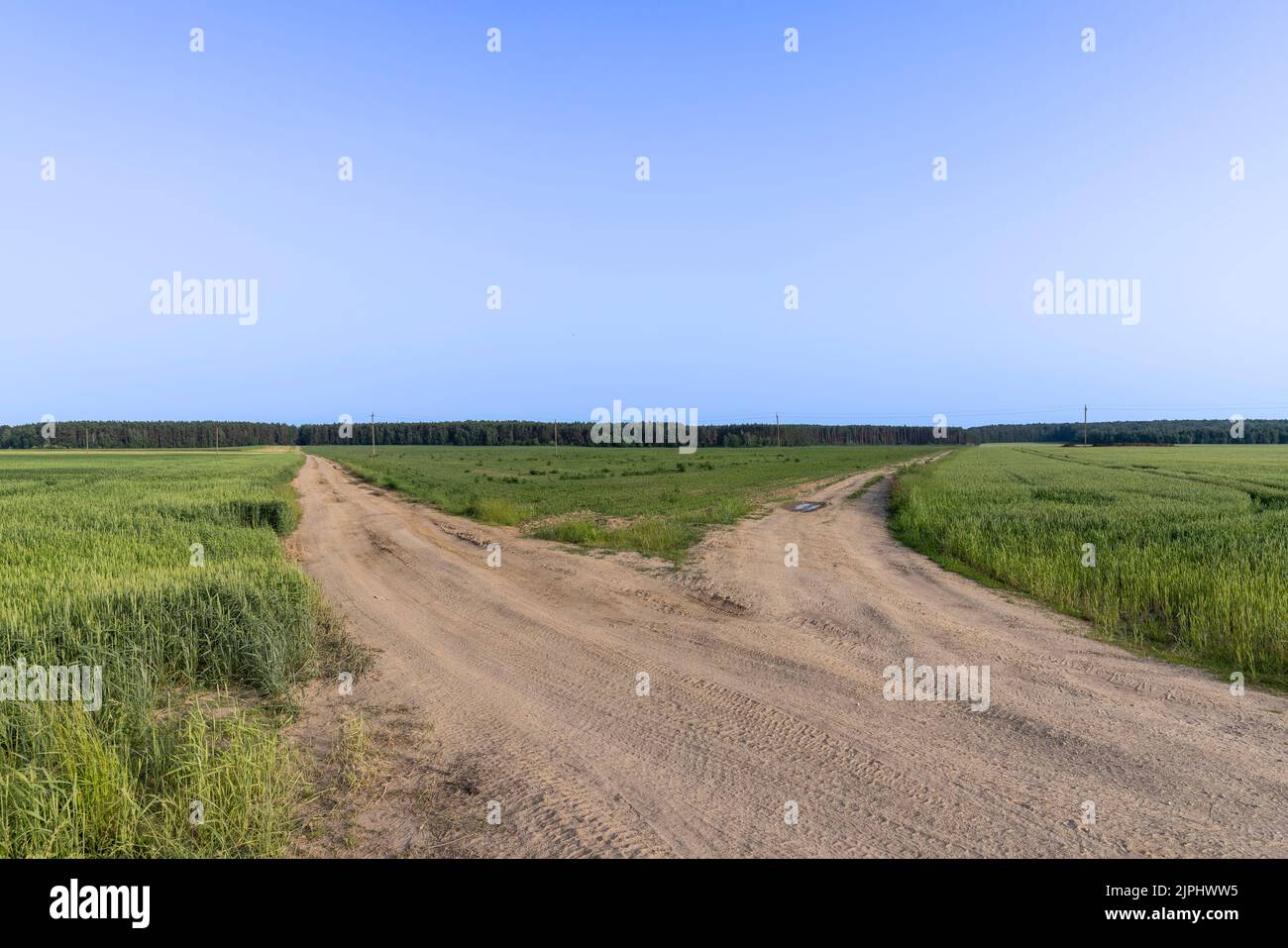 unpaved highway in rural areas, part of the road for cars without ...