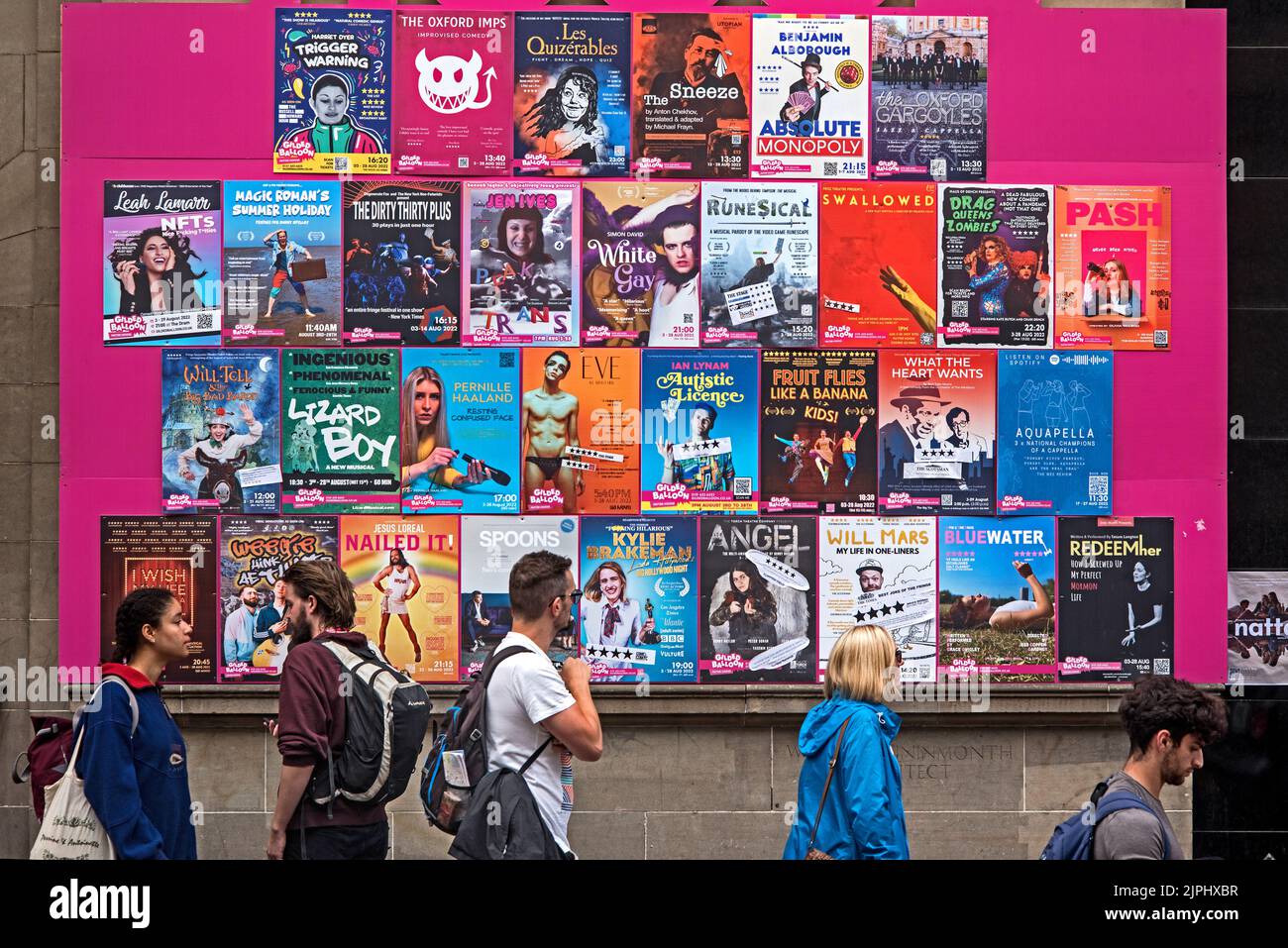 People walking by Edinburgh Fringe Festival posters outside the Gilded ...