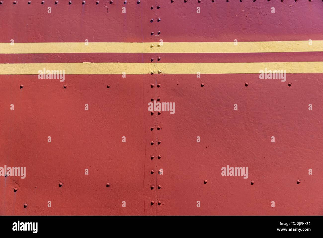 Part of the metal structure of an old steam locomotive, a sheet of ...