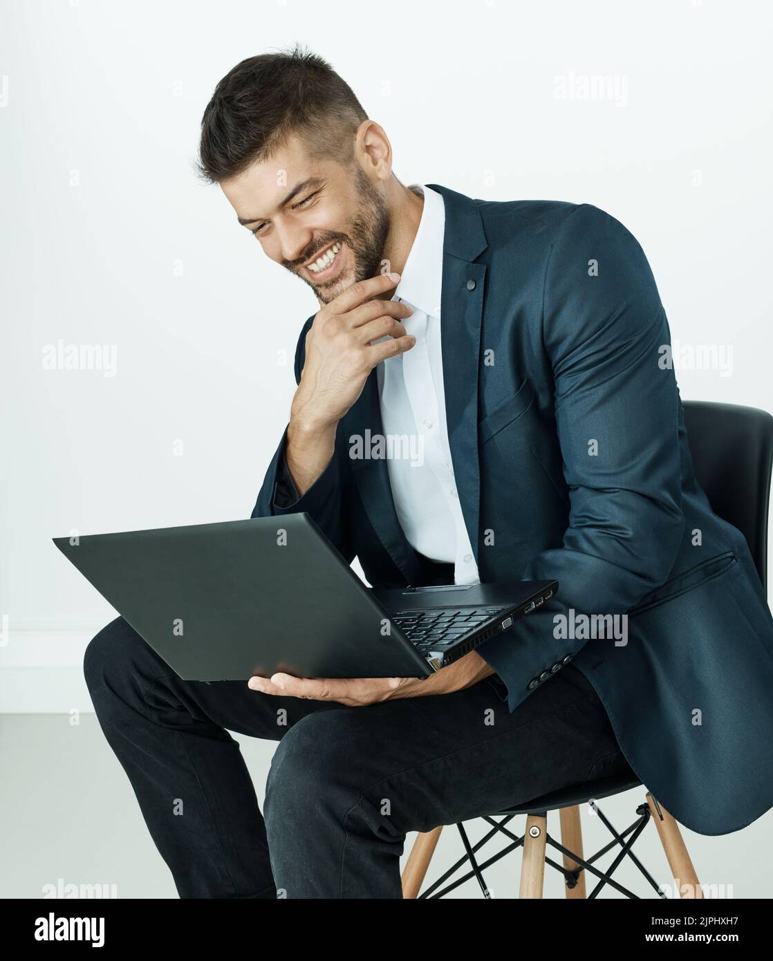 Well dressed man smiles hi-res stock photography and images - Alamy