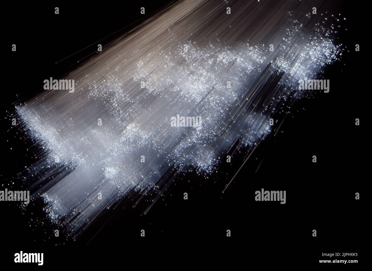 A fiber optic bundle of glass fibers used in computer communications ...