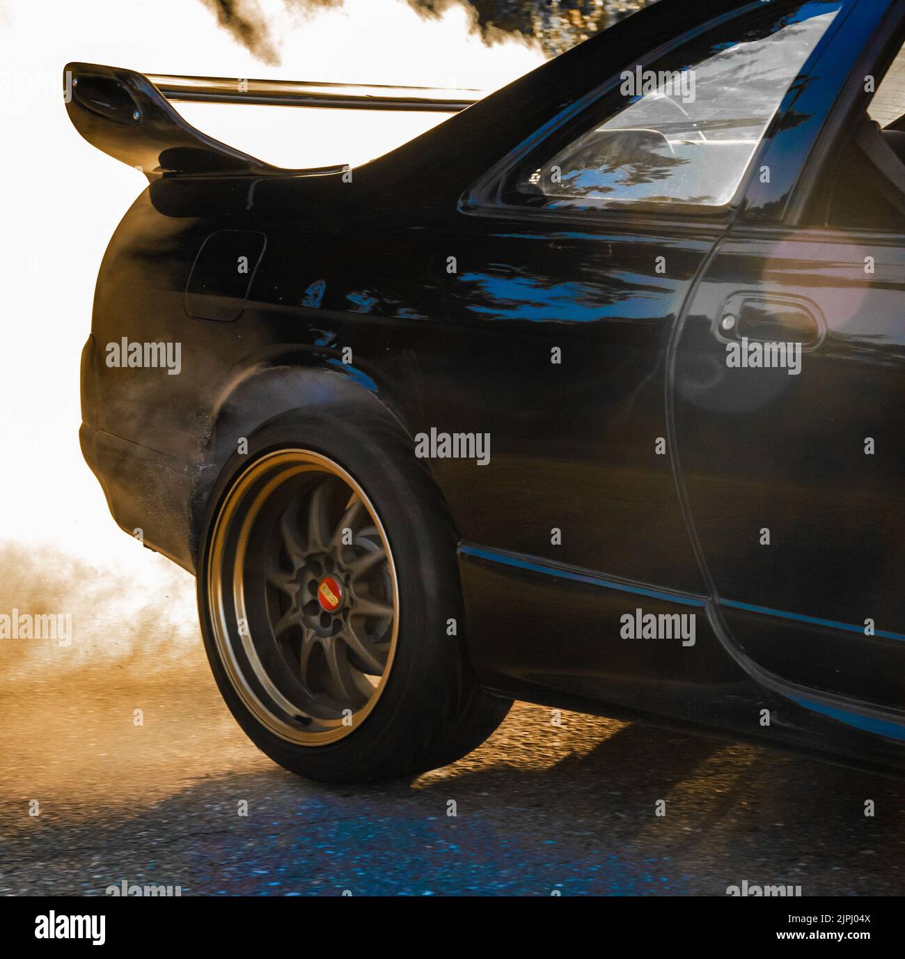 A beautiful shot of a black R32 doing a burnout in Trinidad and Tobago ...