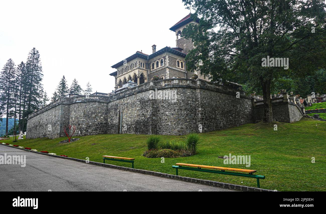 The beautiful Cantacuzino Castle in Busteni, Romania surrounded by ...