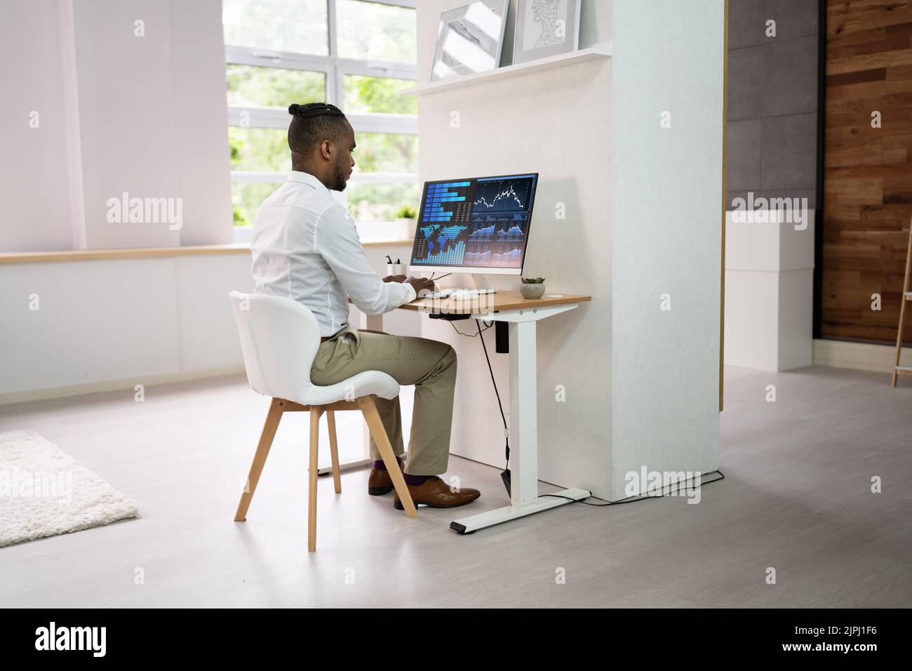 Analyst Man Looking At Business Data Analytics Dashboard Stock Photo ...