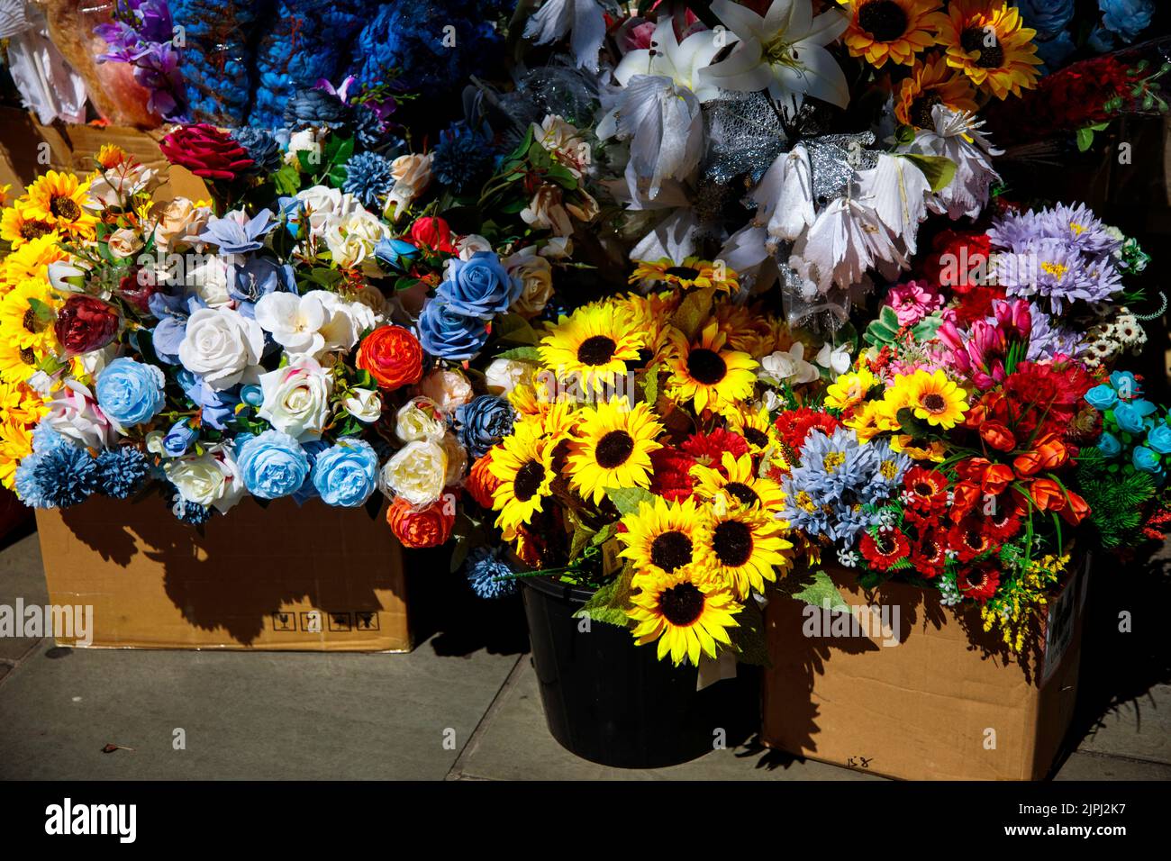 Colorful fake artificial flowers hi-res stock photography and images ...