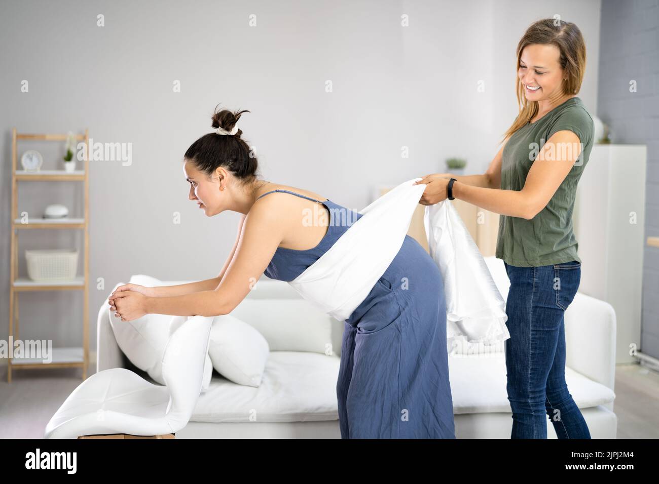 Pregnant Women Baby Check And Support By Doula Stock Photo - Alamy