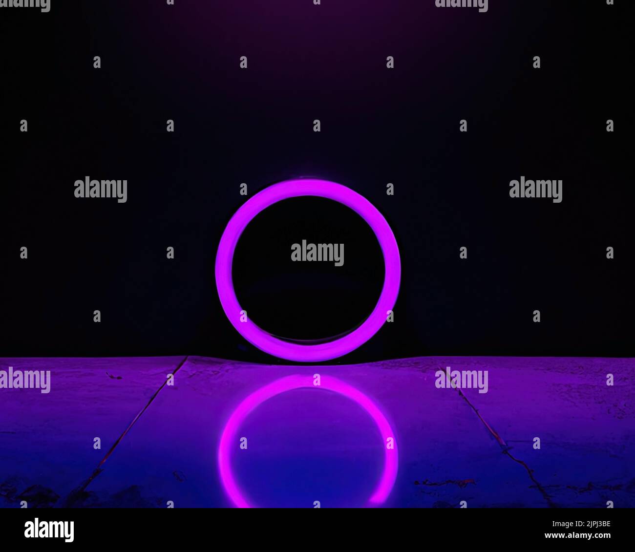 light rings, pink and blue, magenta and turquoise with reflections on ...