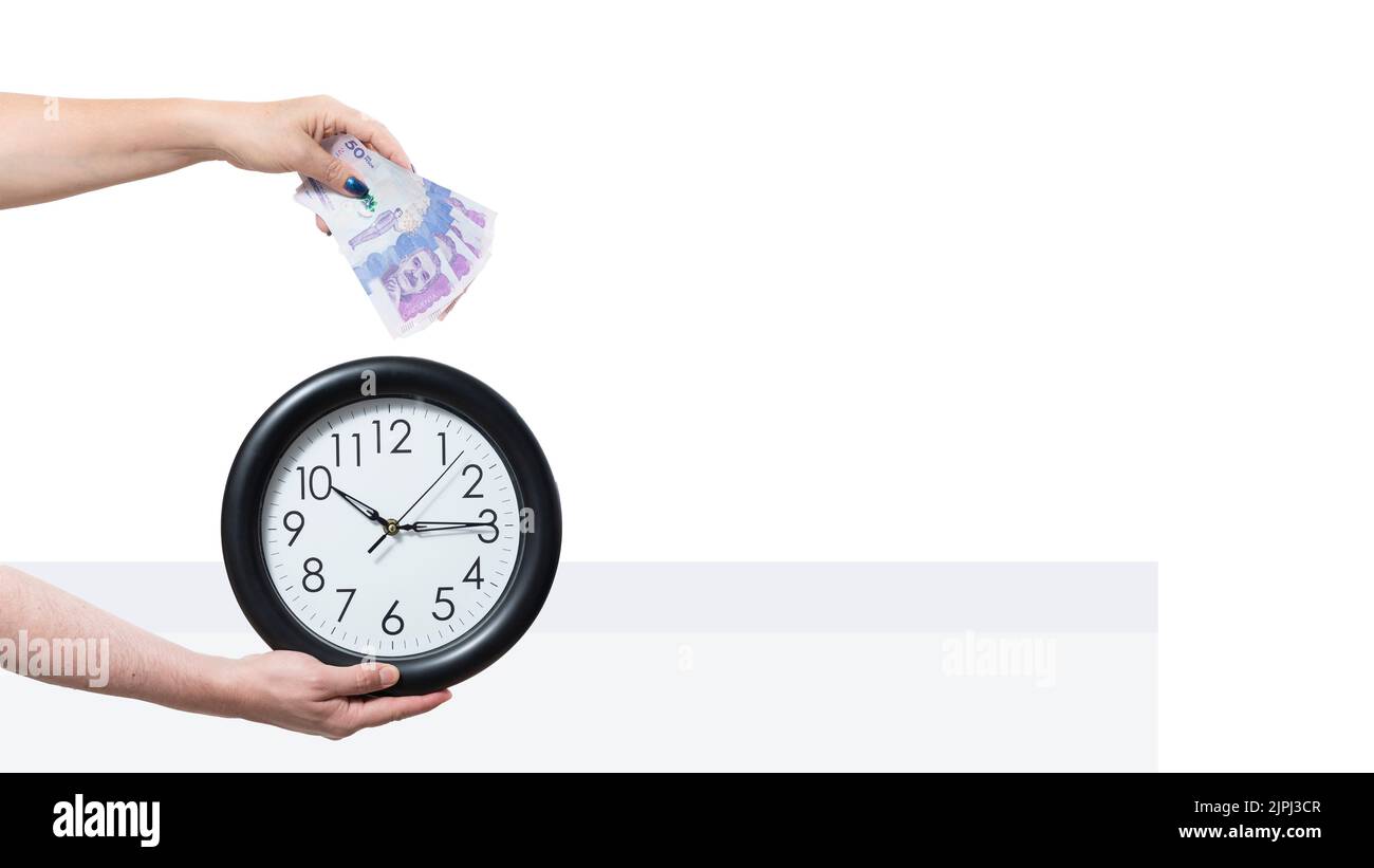female hand holding colombian money over a watch, concept of buying ...