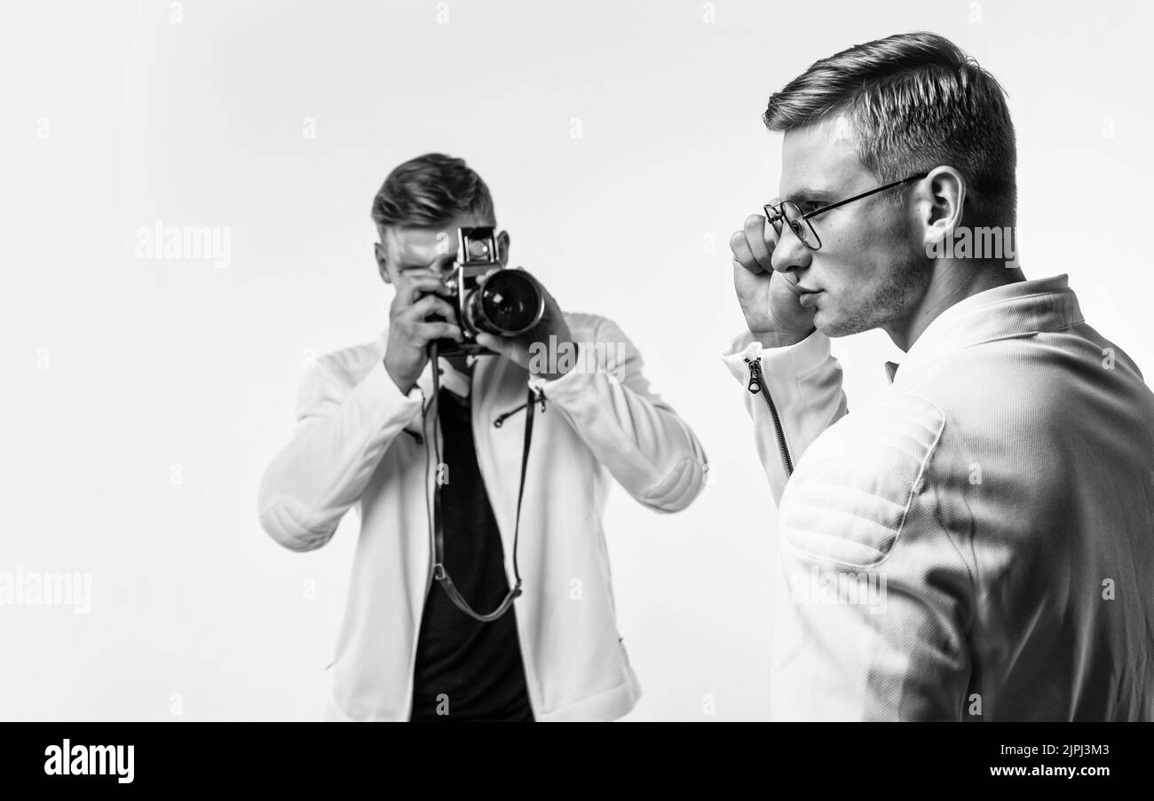 young twin brothers photographer with similar appearance make photo ...
