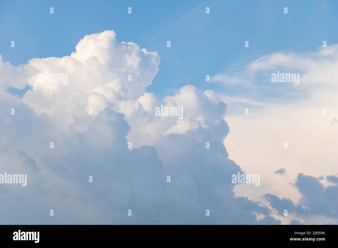 Fluffy clouds in blue sky - From below of fluffy white clouds floating ...