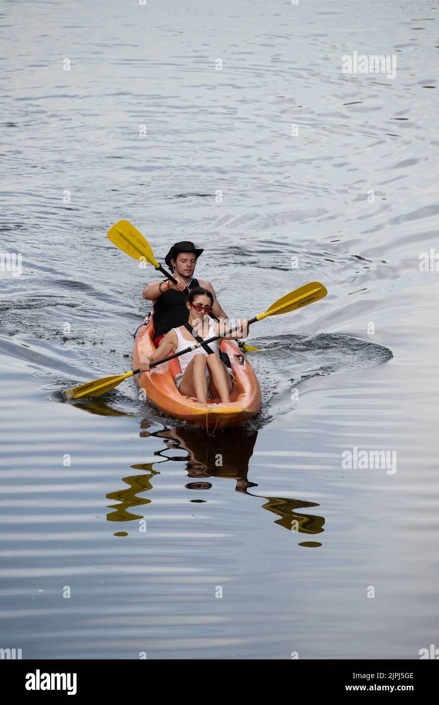 Austin Texas USA, August 14, 2022: Two people paddling in a kayak enjoy ...
