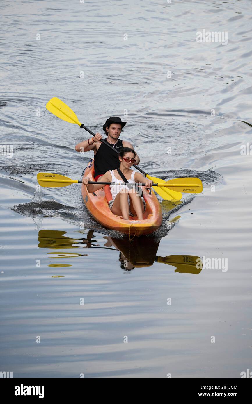 Austin Texas USA, August 14, 2022: Two people paddling in a kayak enjoy ...