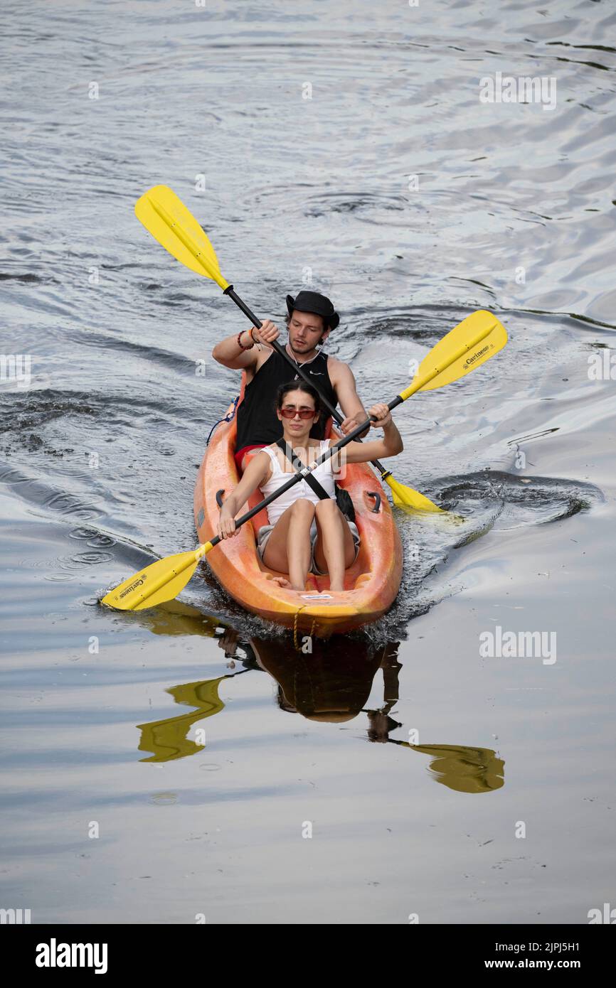 Austin Texas USA, August 14, 2022: Two people paddling in a kayak enjoy ...
